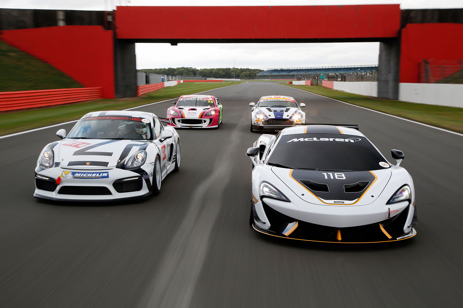 McLaren 570S GT4 vs Aston Martin Vantage GT4, Porsche Cayman GT4 and ...