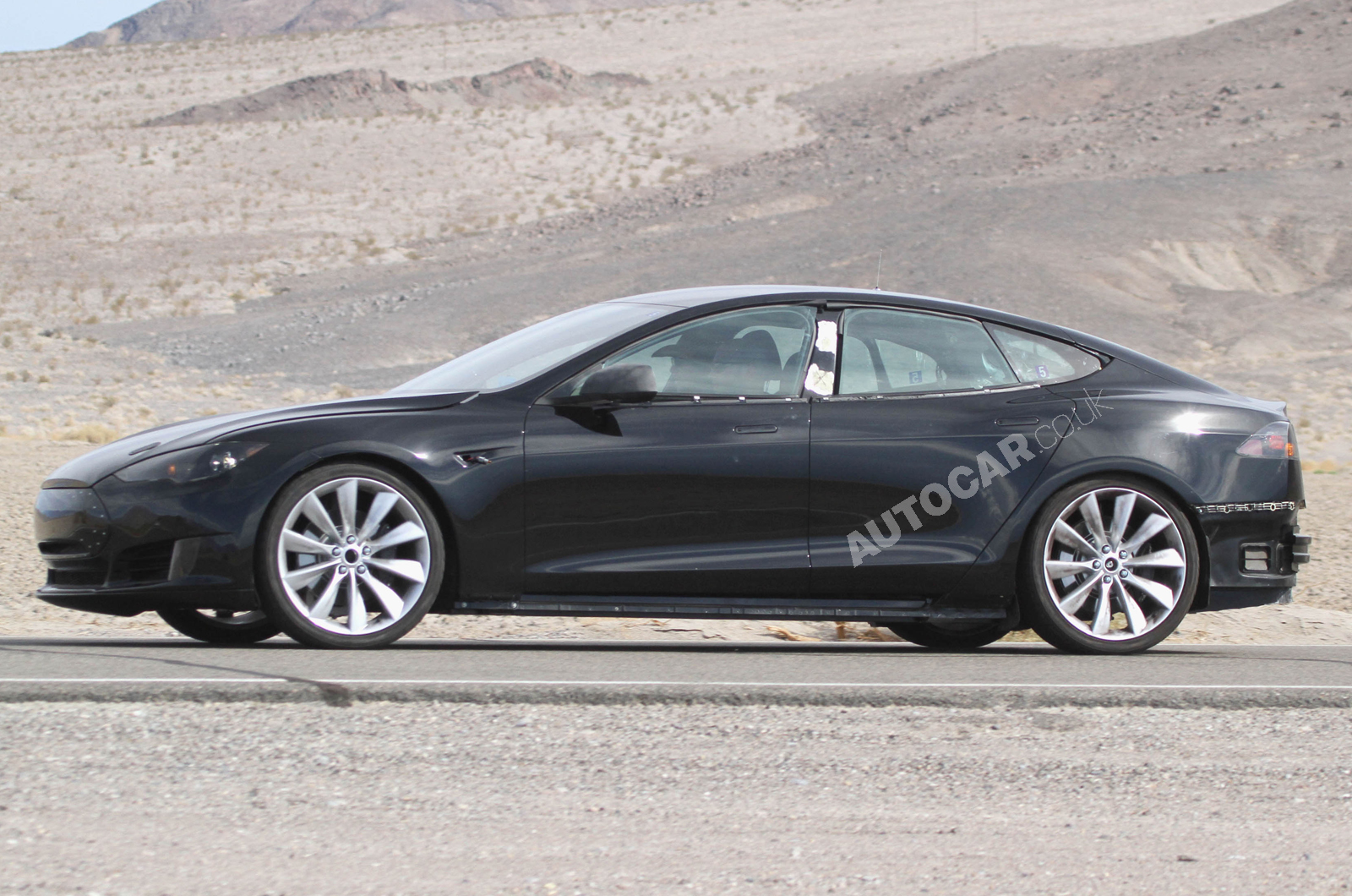 Tesla takes on BMW 5-series | Autocar